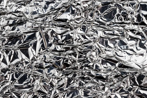 Texture of crumpled aluminum kitchen foil. - Stock Image - Everypixel