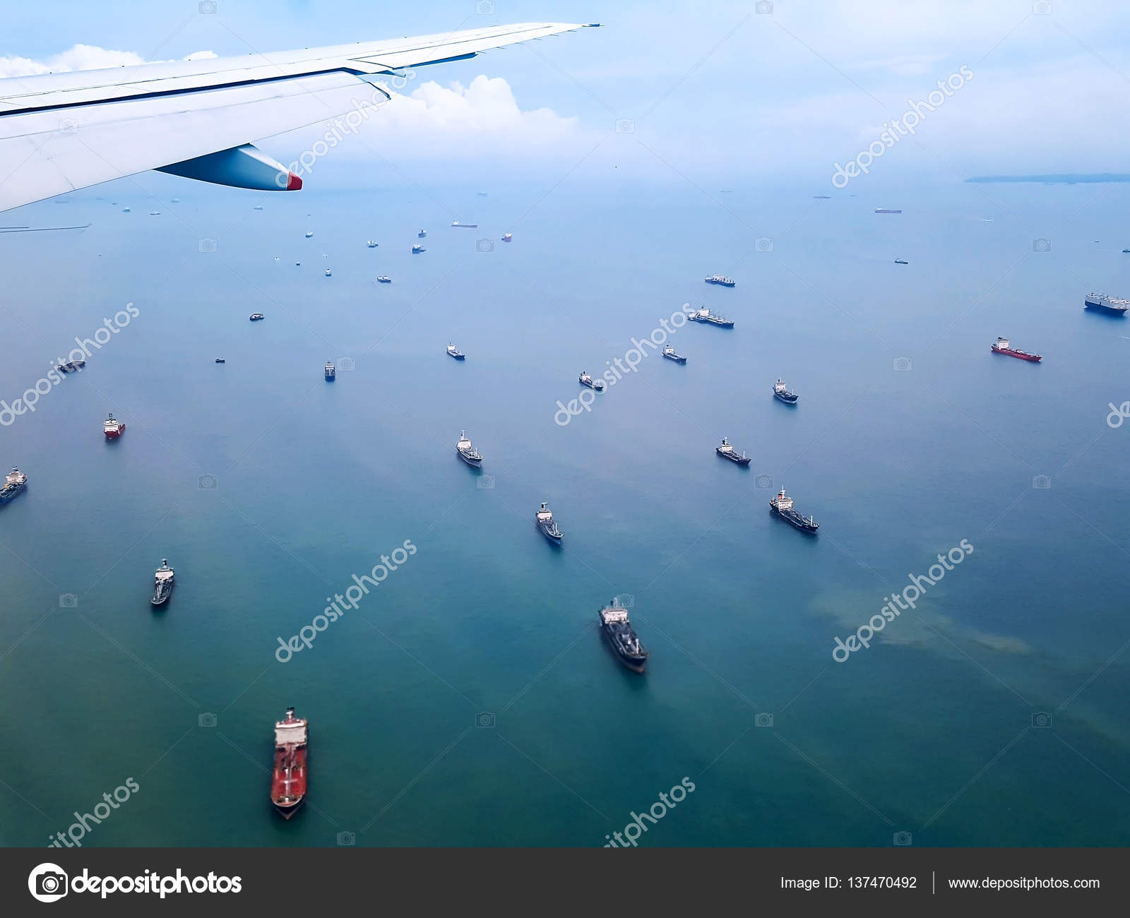 Many cargo ships float in the sea — Stock Photo © etaphop #137470492