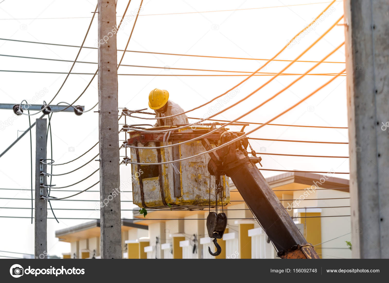 Electricians are installing power lines — Stock Photo © etaphop #156092748