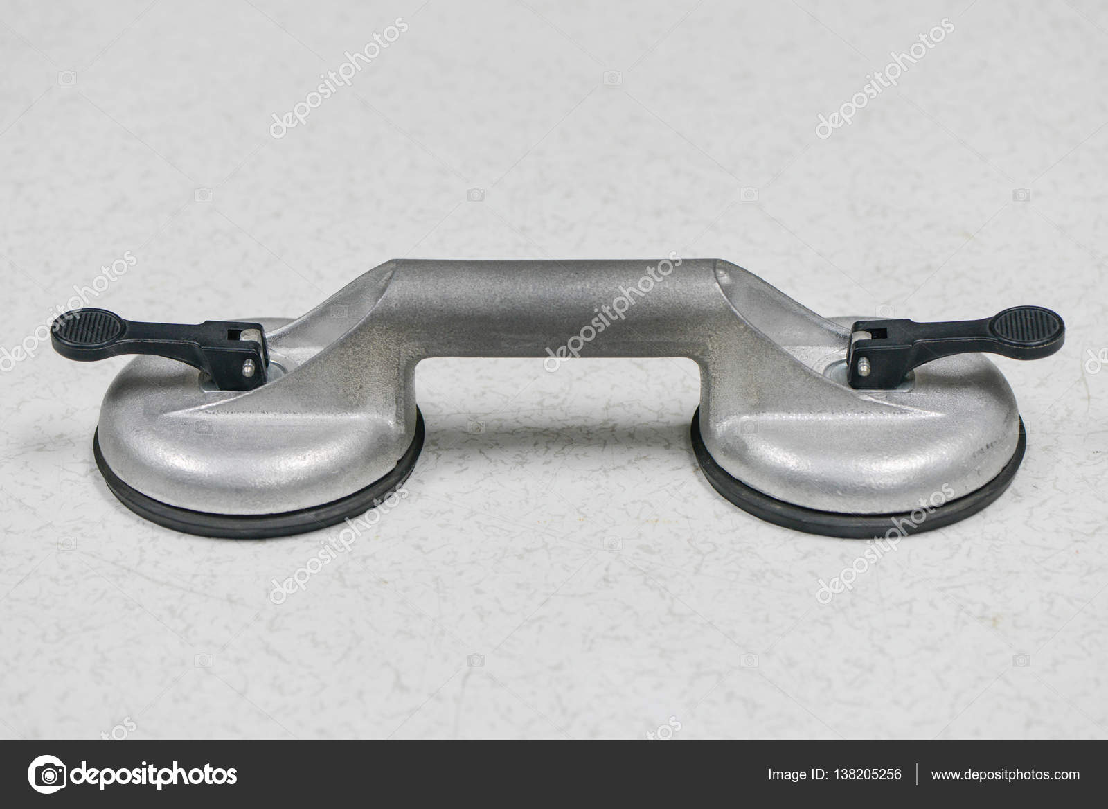 Raised floor tile lifter Stock Photo by ©magneticmcc 138205256