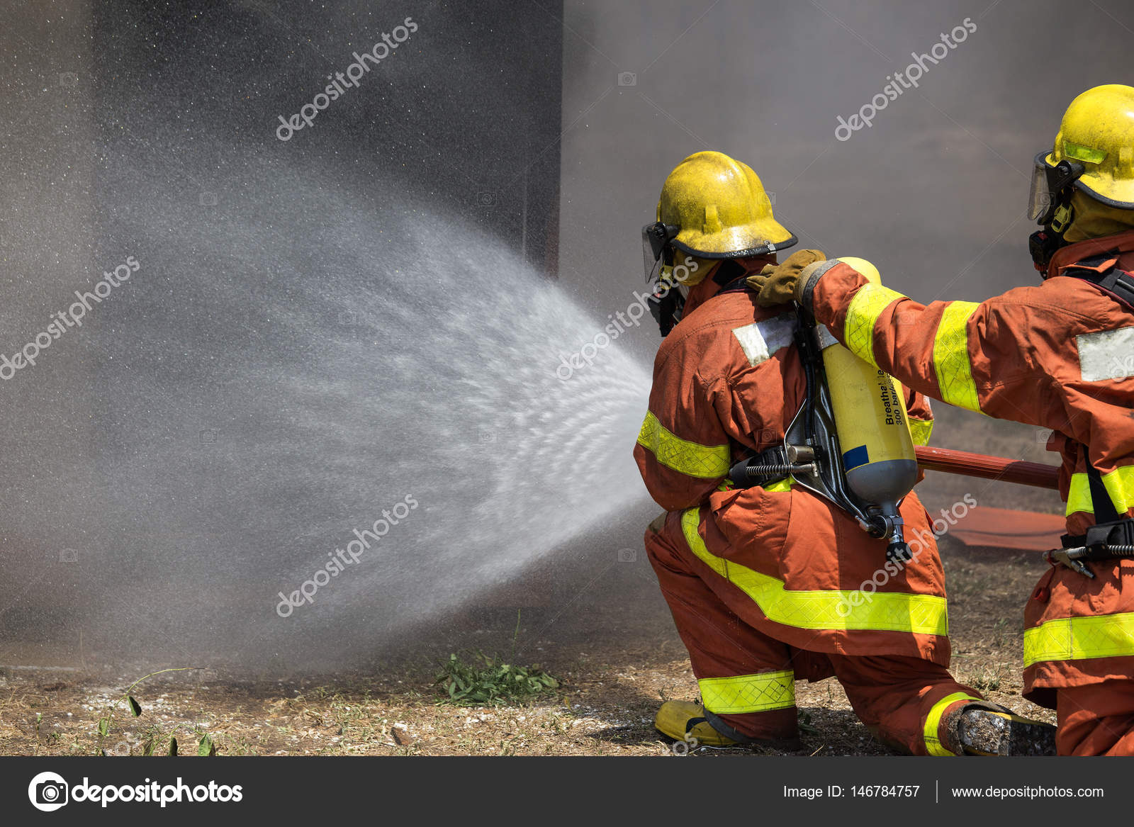 Firefighter Hose Spraying