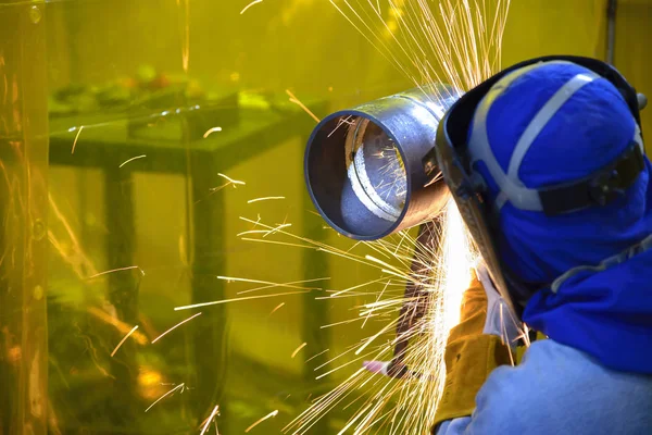 The skill worker use hand grinder machine - Stock Image - Everypixel