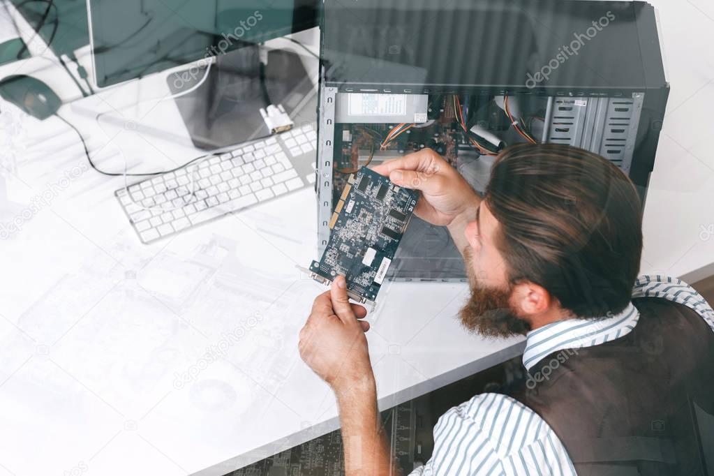 Engineer inspecting microcircuit, double exposure — Stock Photo ...