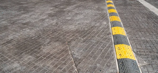Road bump on the road for reduce speed. - Stock Image - Everypixel