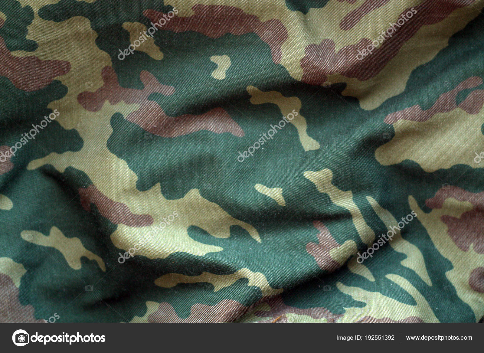 Military uniform pattern. Stock Photo by ©pavelalexeev 192551392