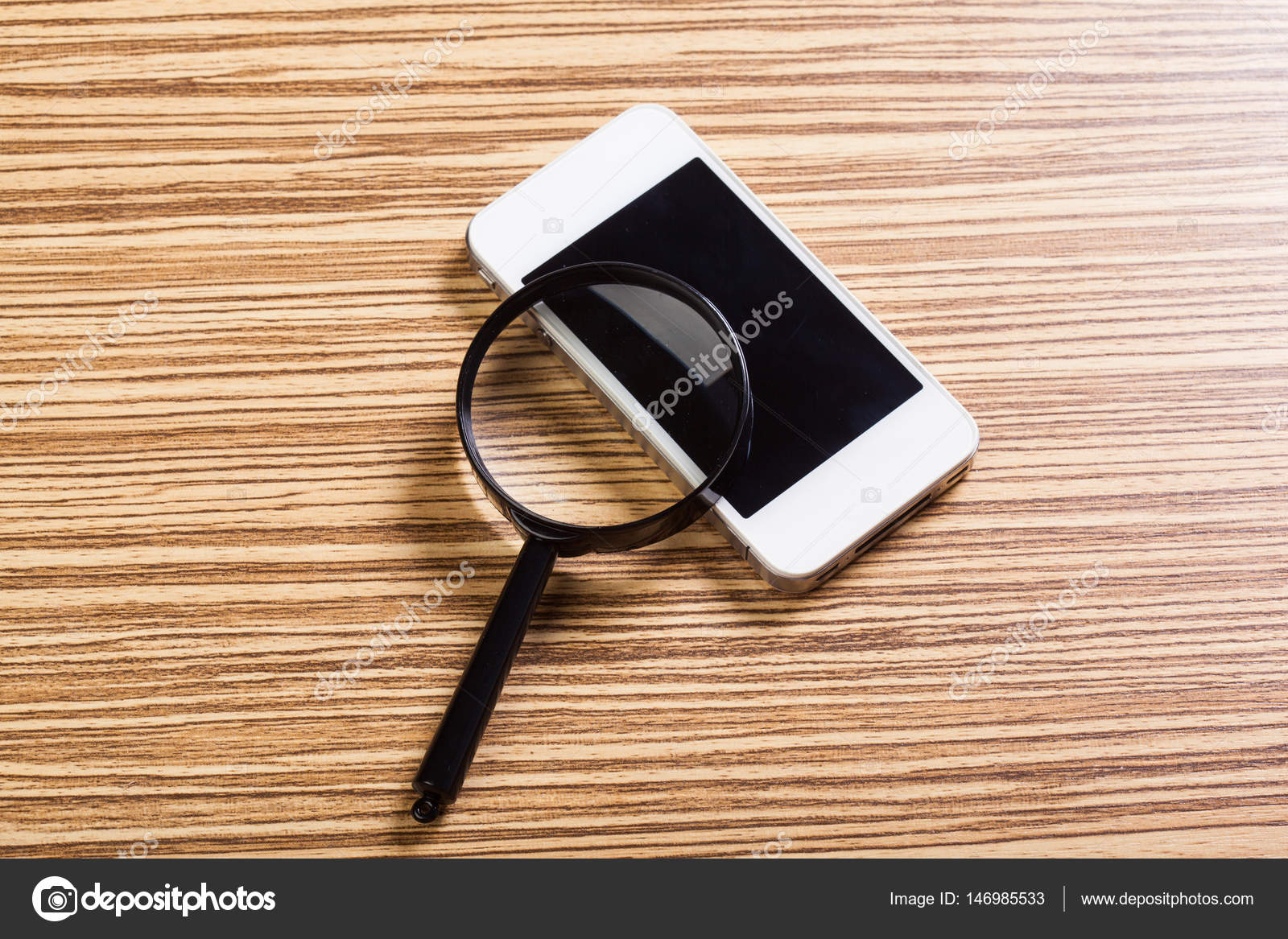 Mobile Phone and Magnifying Glass Stock Photo by ©Fotofabrika 146985533