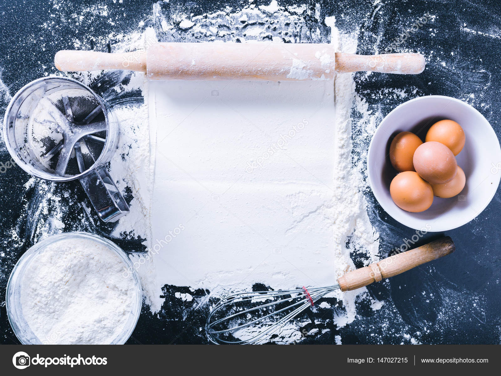 Baking dark background with blank cook book, eggshell, bread, flour ...