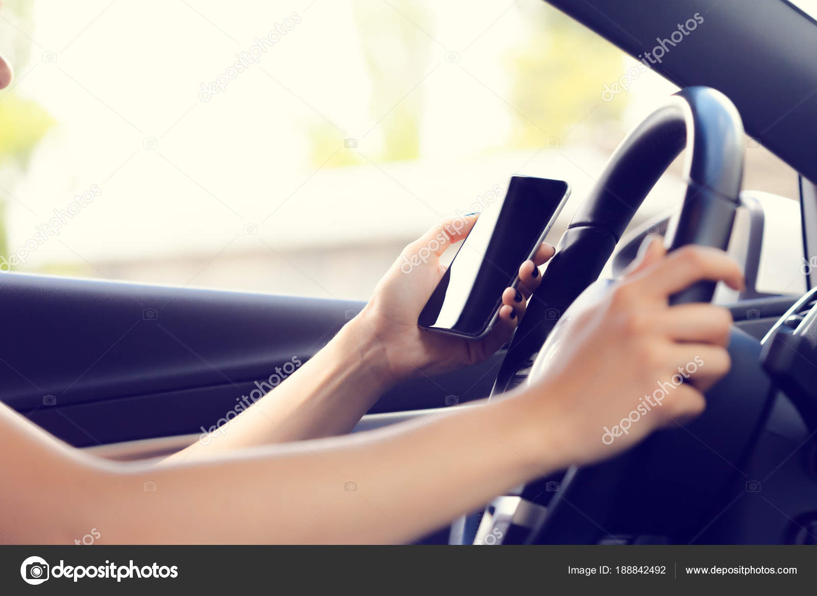 Female Driver Using Cellphone Stock Photo by ©Fotofabrika 188842492