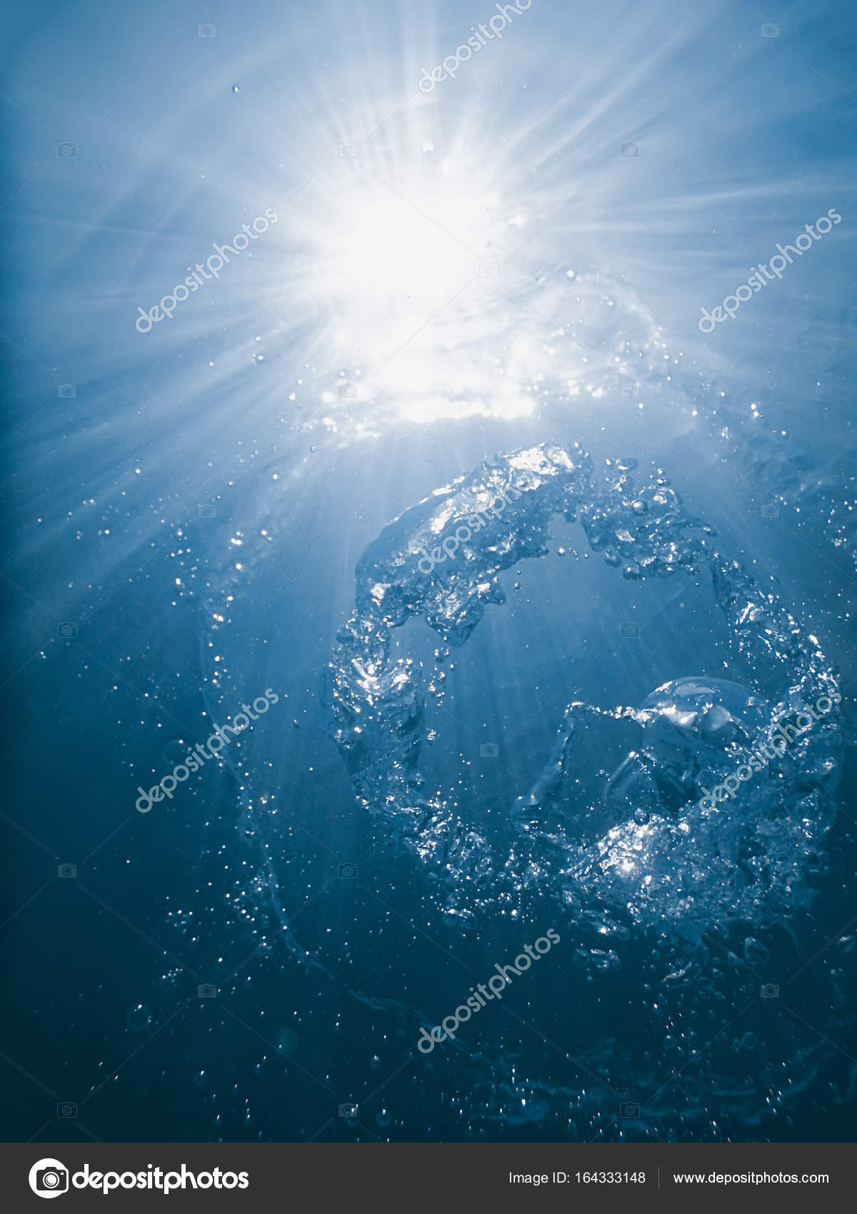 Underwater Looking Up At Sun