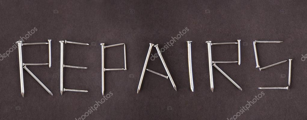 Word repairs made from nails Stock Photo by ©borjomi88 125934168