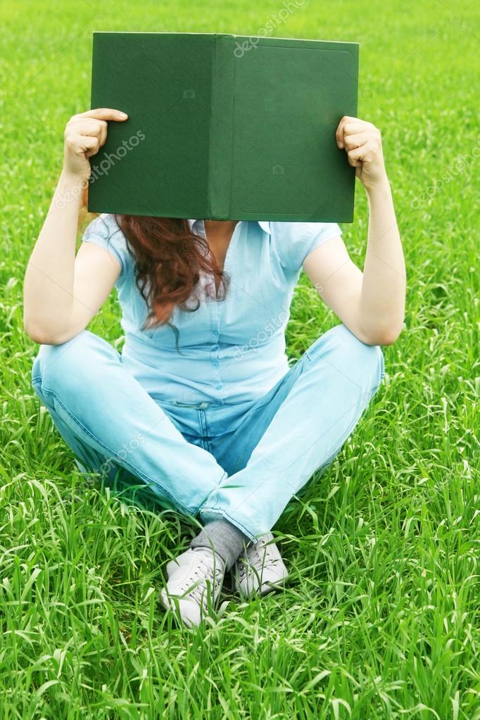 Girl reading green book Stock Photo by ©borjomi88 126840930