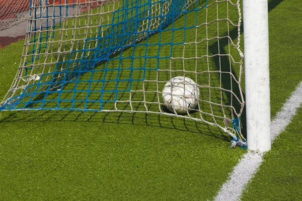 Football in net goal Stock Photos, Royalty Free Football in net goal ...