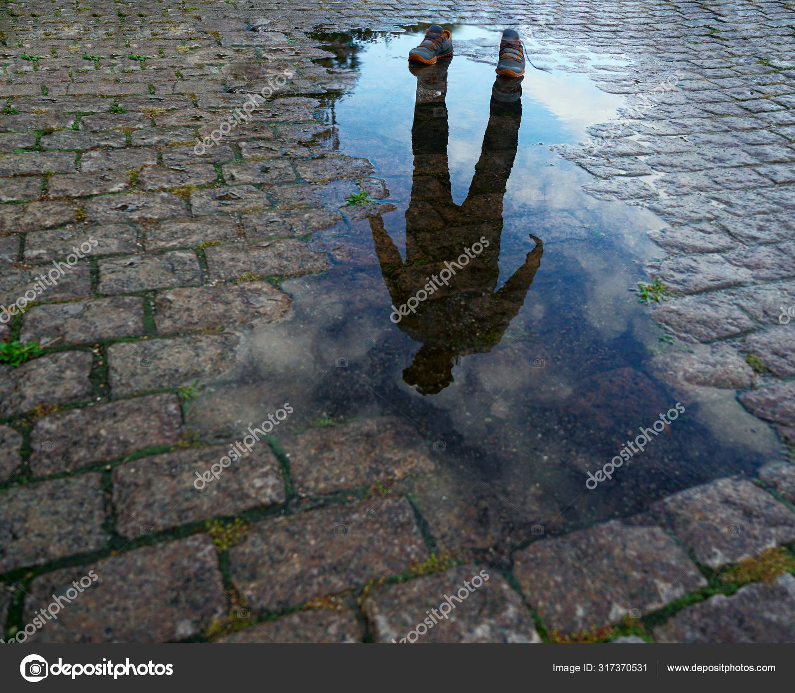 Reflection Man Standing Puddle Stock Photo by ©borjomi88 317370531