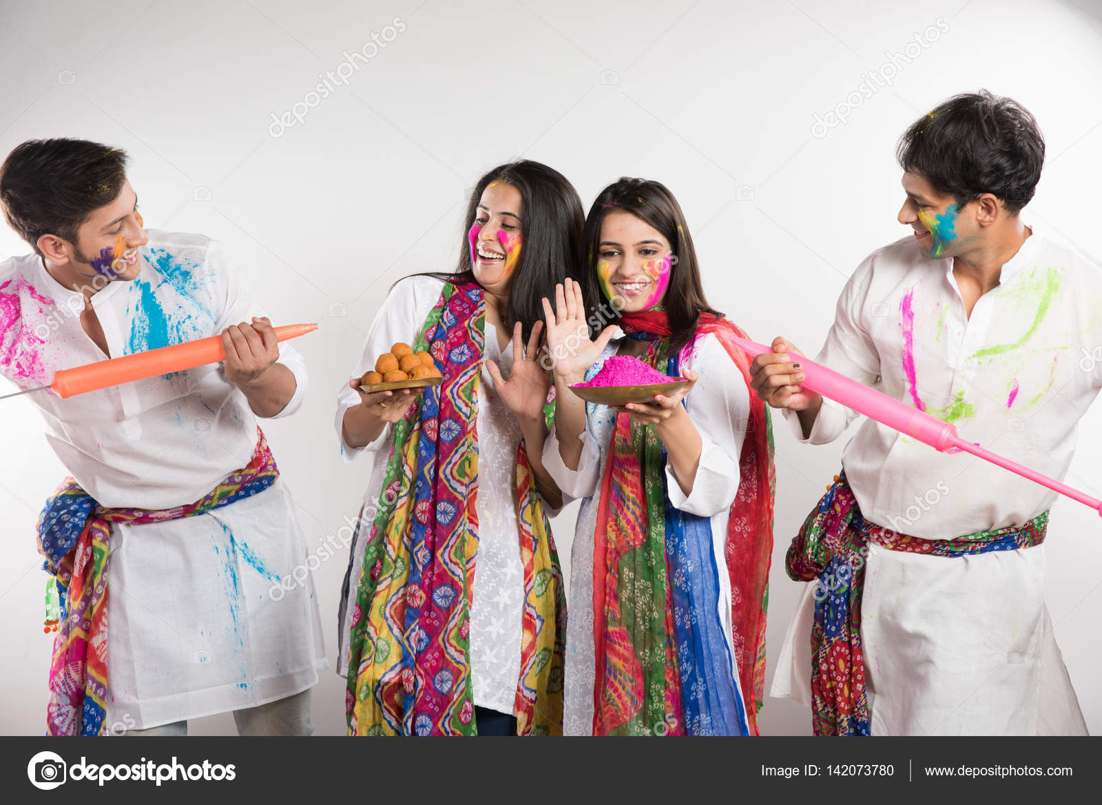 Indian people celebrating holi or playing holi colours Stock Photo by ...