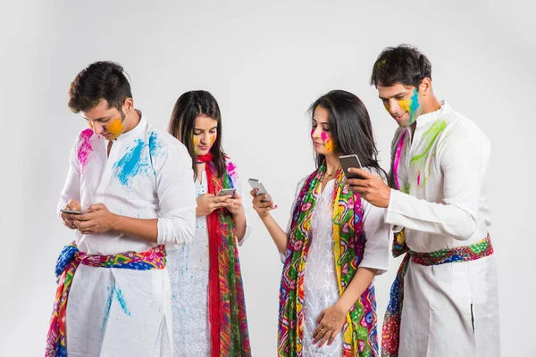 Indian people celebrating holi or playing holi colours — Stock Photo ...