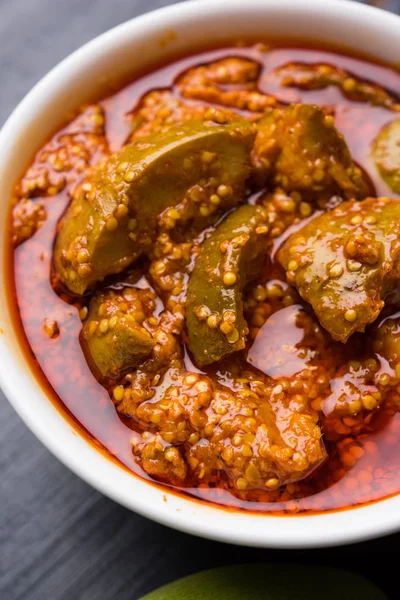Homemade Mango Pickle or aam ka achar or achaar in white bowl ...