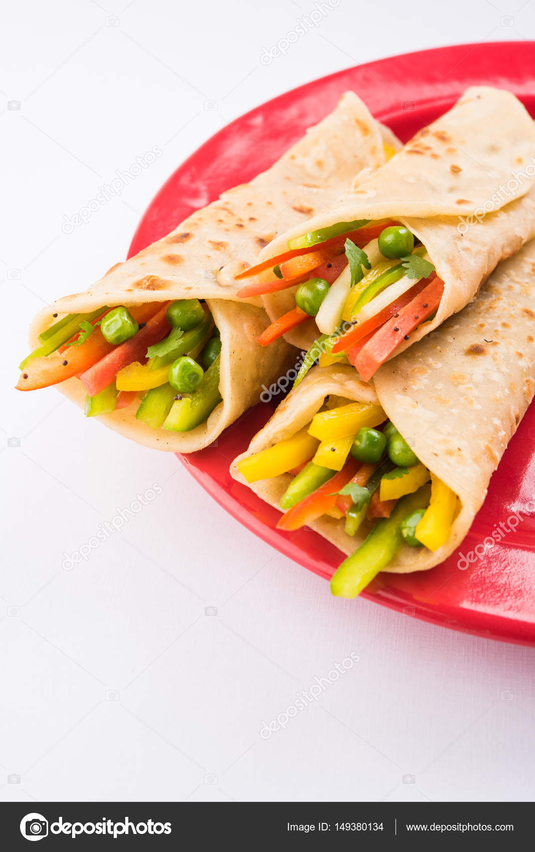 Indian popular snack food called Vegetable spring rolls or veg franky ...
