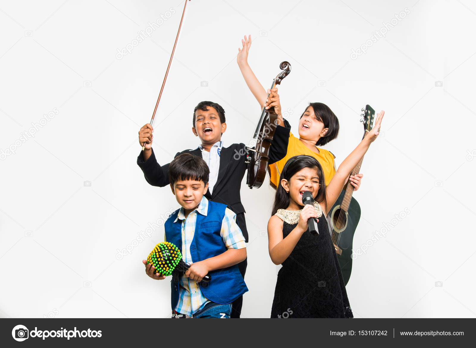 Indian kids performing and singing while playing guitar, violin, flute ...