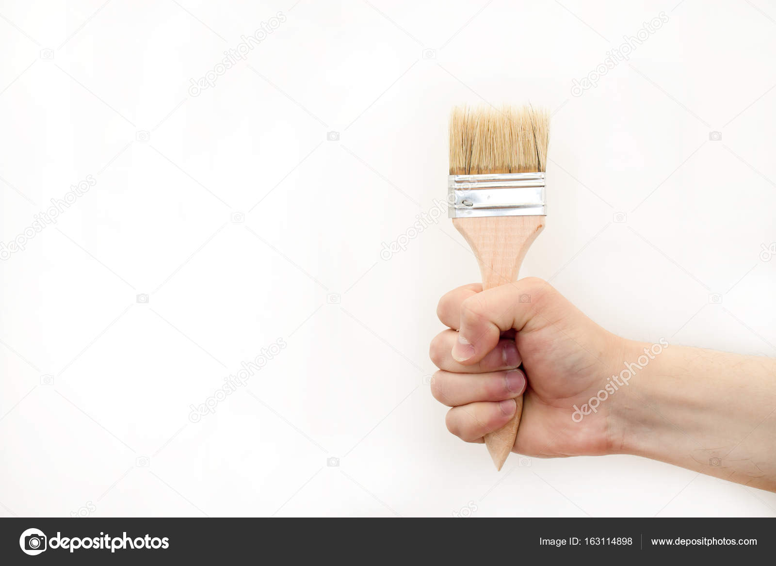 Building brush in hand — Stock Photo © kirilllutz #163114898