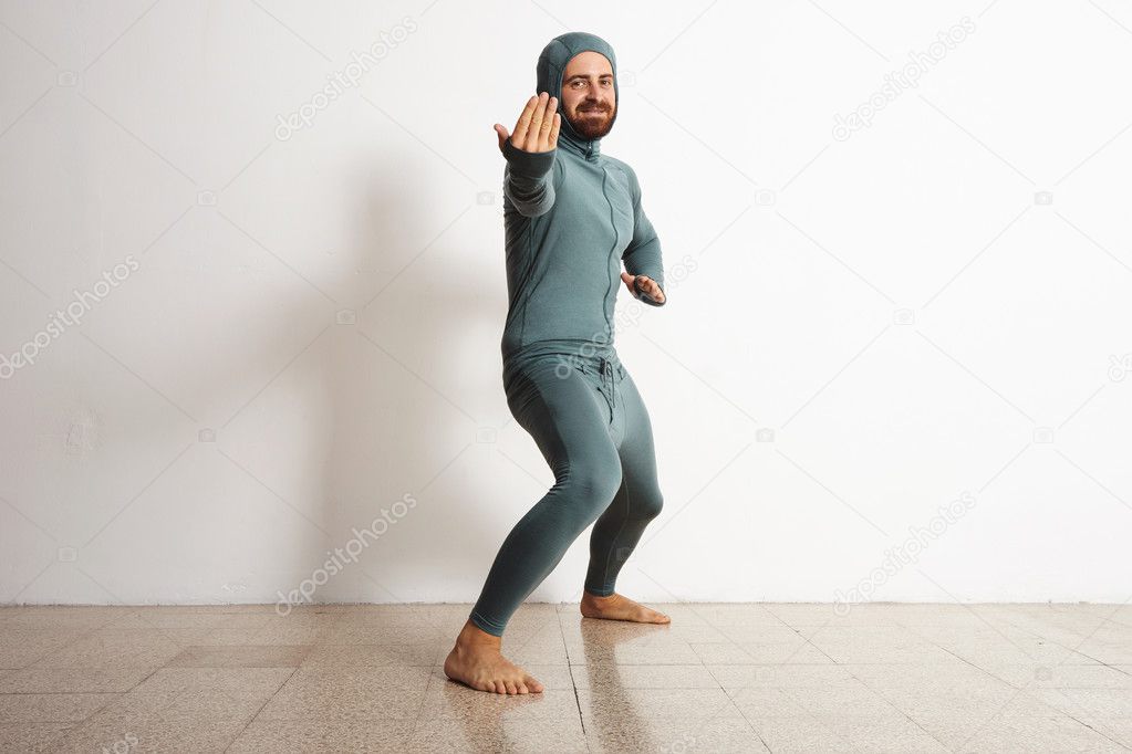 Sportsman acts like a ninja — Stock Photo © derepente #126381690