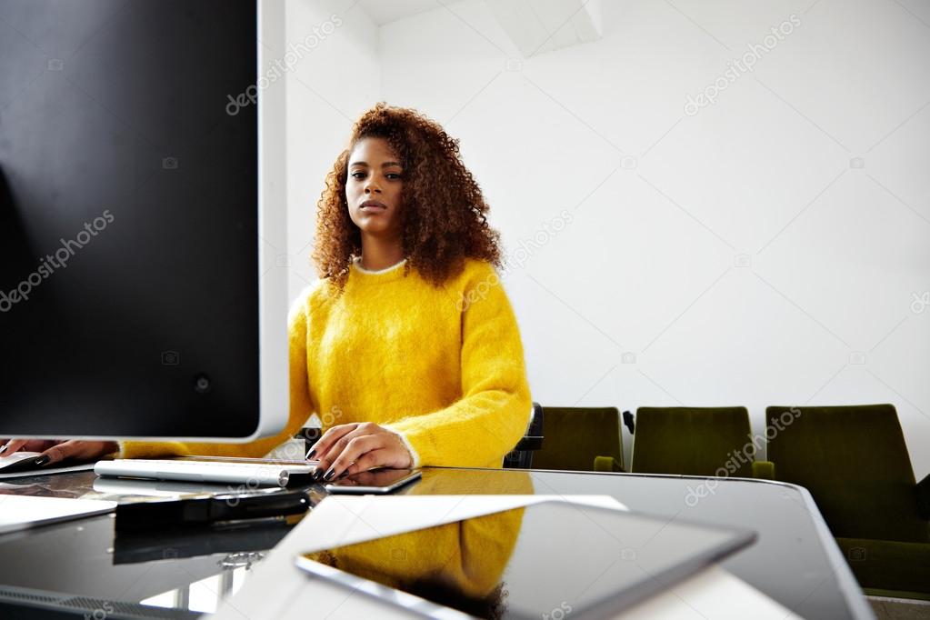 Black Woman Working At Desk