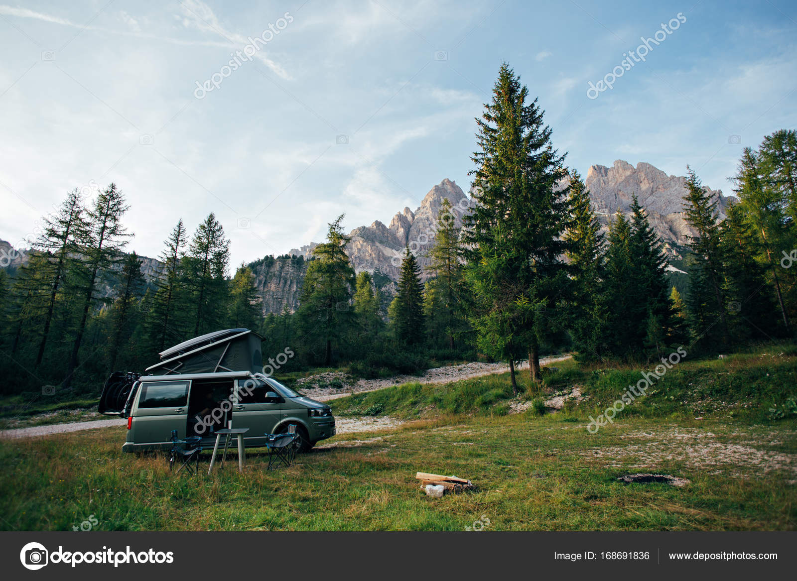Small travel vehicle camping van Stock Photo by ©derepente 168691836