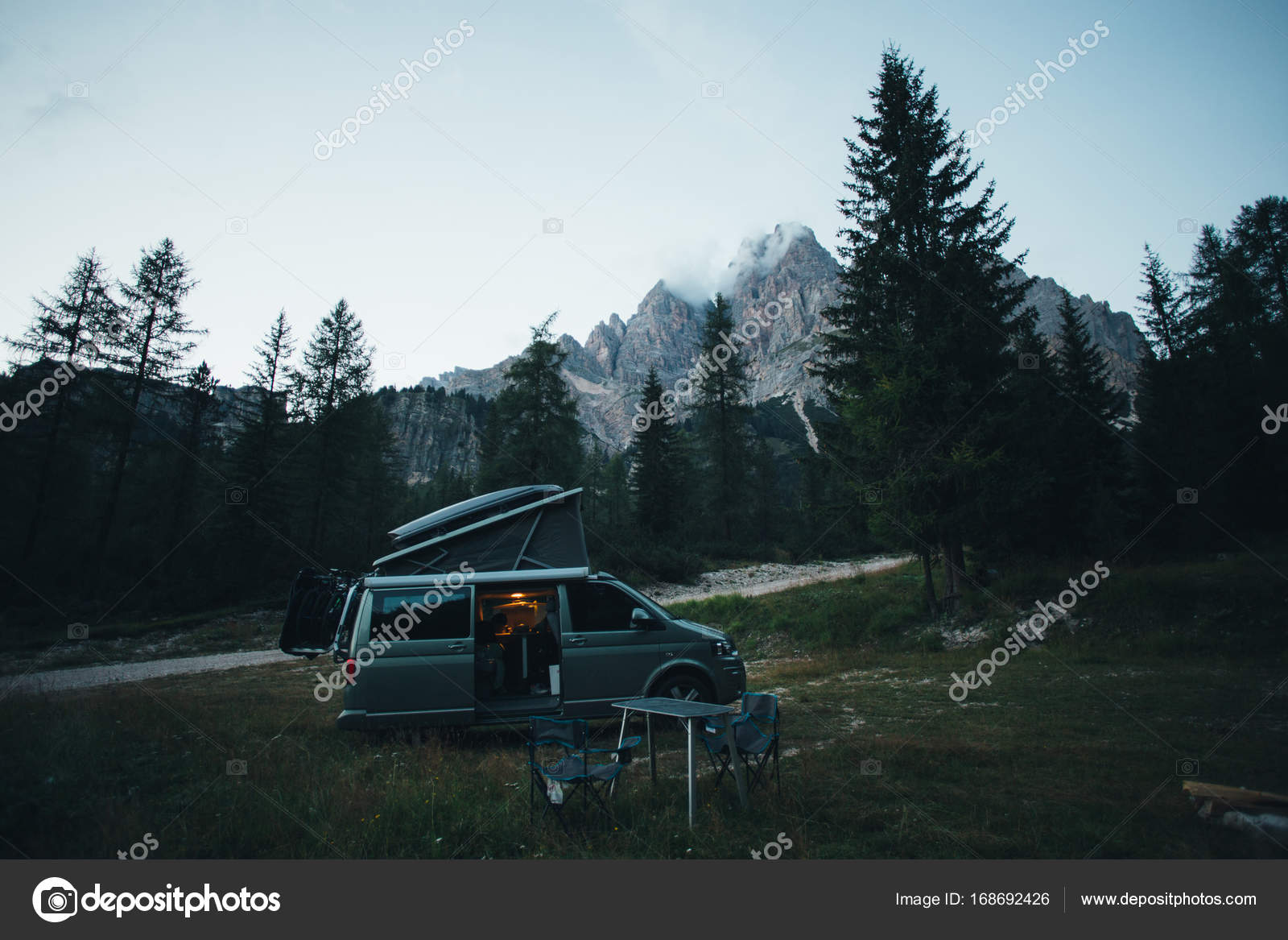 Camper van on rest stop under mountains — Stock Photo © derepente ...