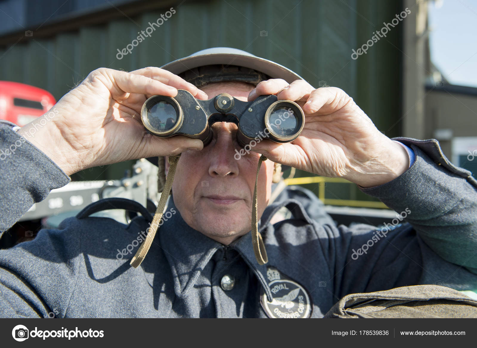 Male Royal Observer Corps Veteran Looking Through Binoculars Stock ...