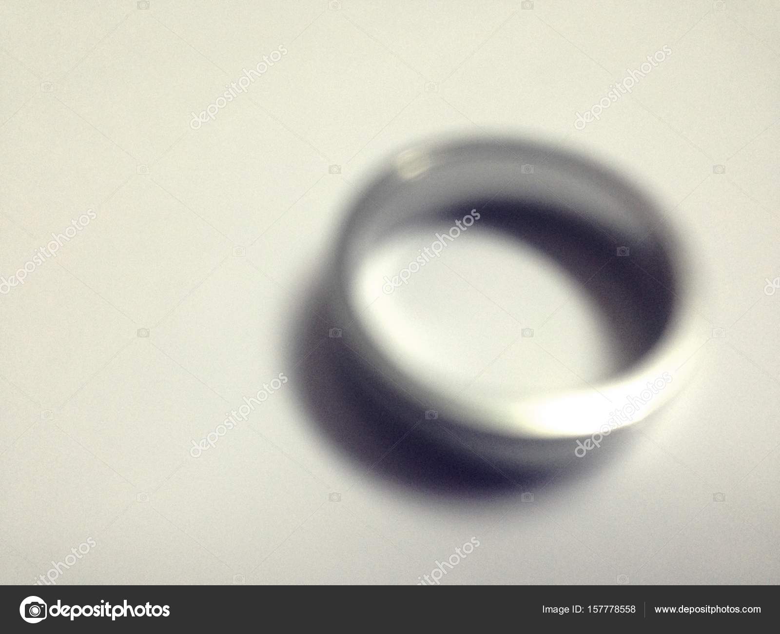 Blurring a silver ring — Stock Photo © LookTarnPhoto #157778558