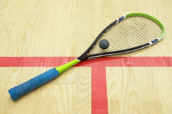 Squash racket and ball on the court Stock Photo by ©AlterPhoto 139713484