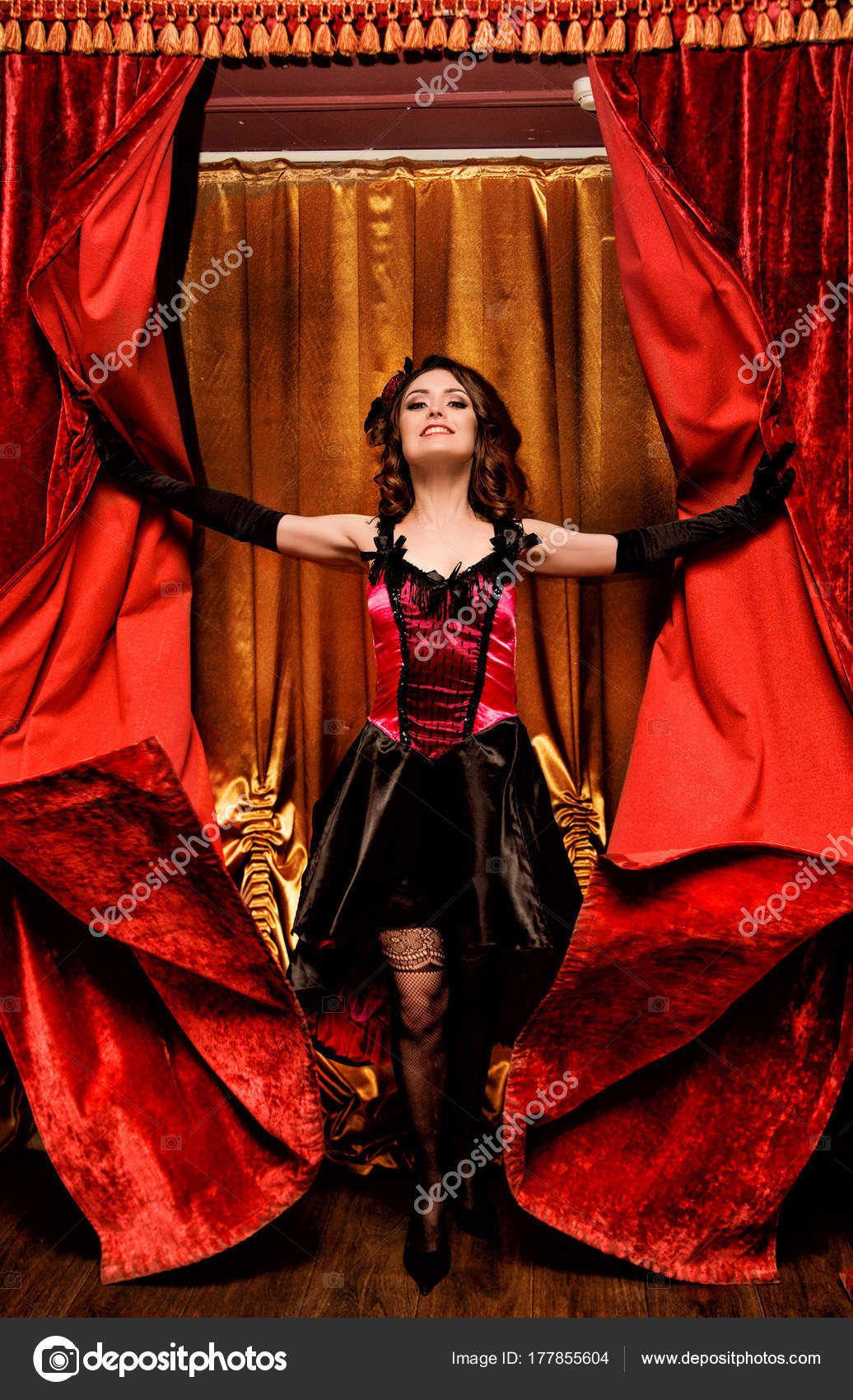 Elegant dancer in style enters the stage Stock Photo by ©Ribalka 177855604