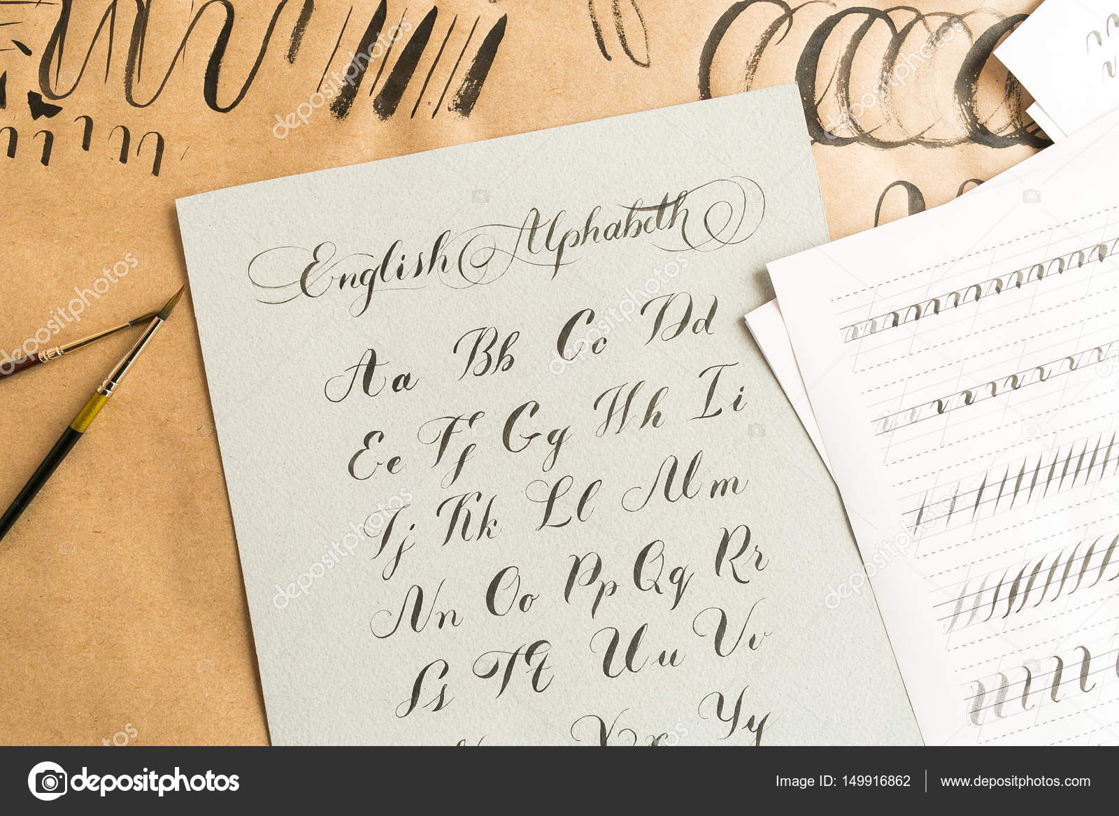 Hand drawn latin calligraphy of brush script. calligraphical letters of ...