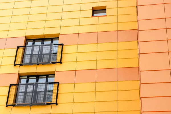 Facade of building with different colors. Yellow and orange - Stock ...