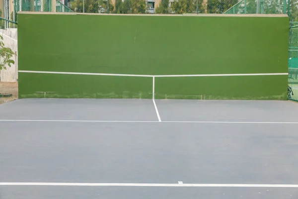 Outdoor Empty tennis knock board at thailand Stock Photo by ©moxumbic ...