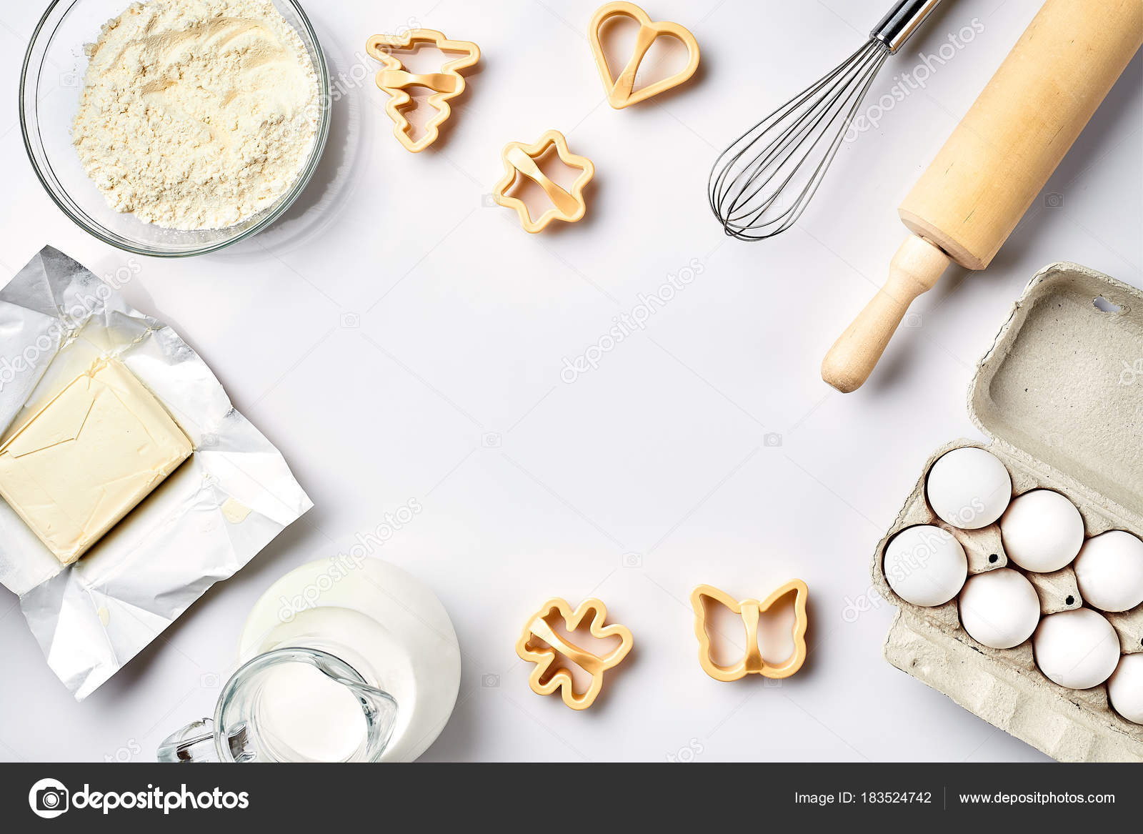 Objects and ingredients for baking, plastic molds for cookies on a ...