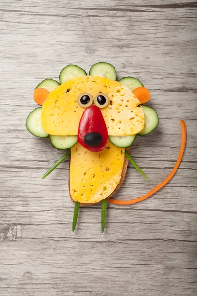 Lion made of bread, cheese and vegetables - Stock Image - Everypixel