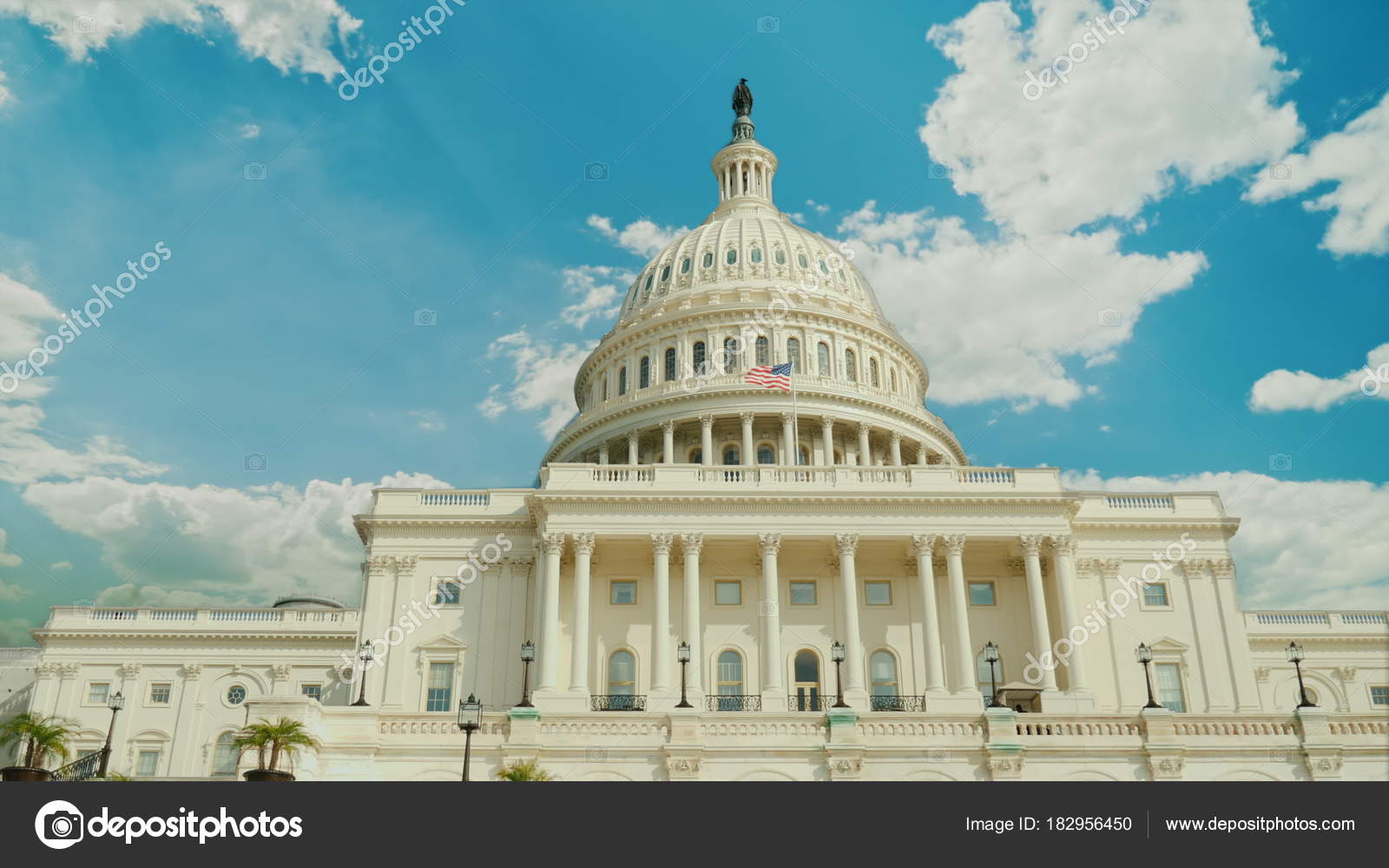 Over the famous Capitol building in Washington, DC, clouds swiftly ...