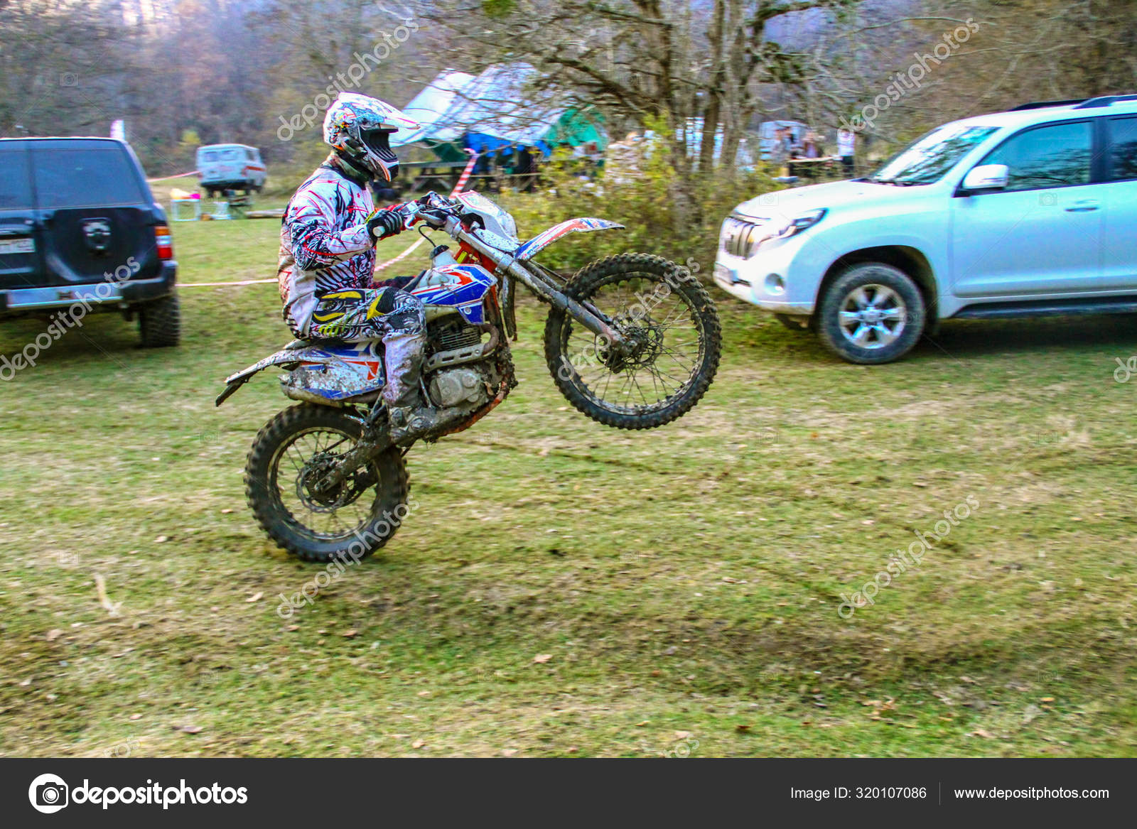 View of a motorcycle racer rearing a motorcycle — Stock Editorial Photo ...