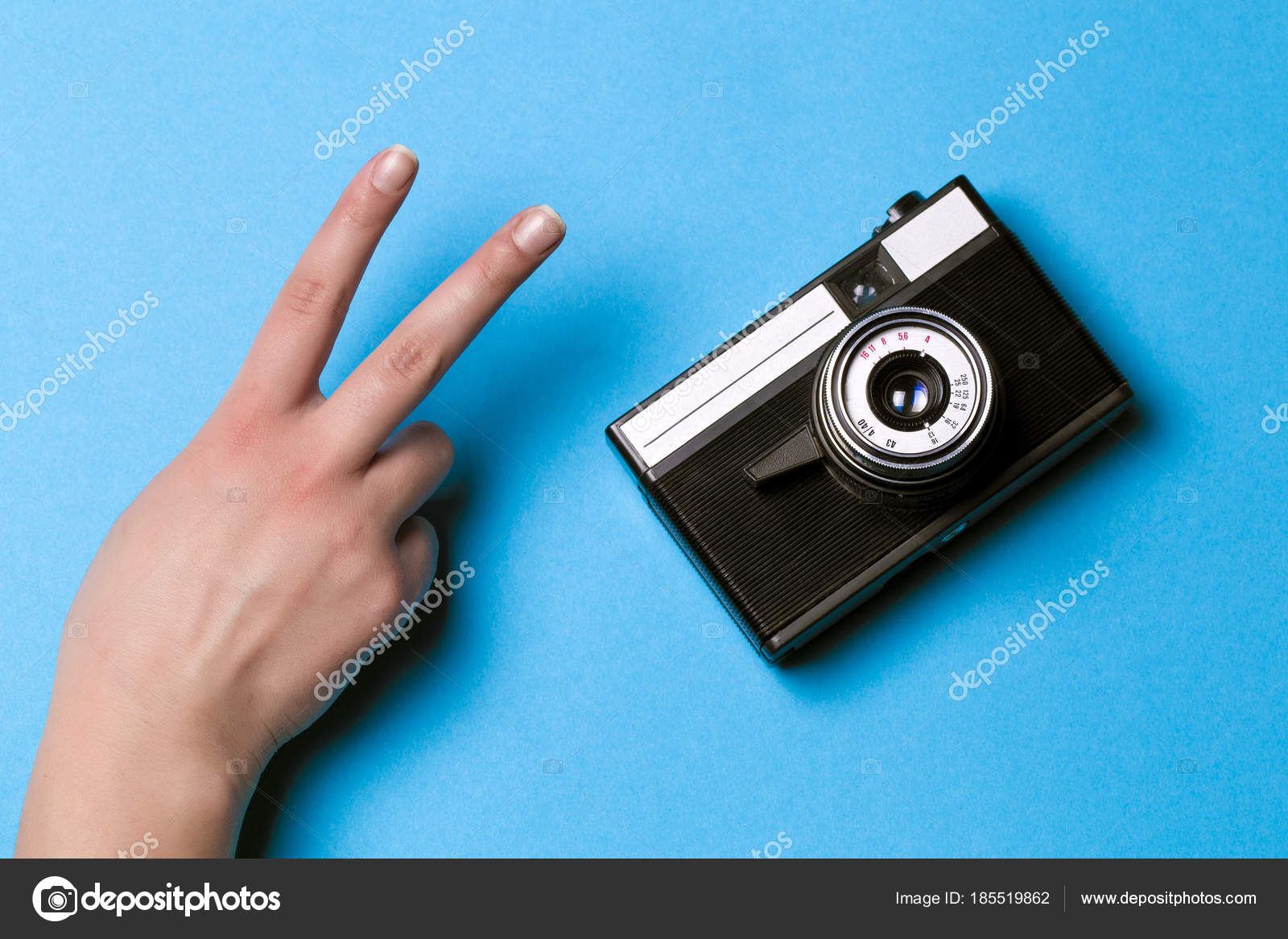 Retro camera and hand — Stock Photo © AlesMunt #185519862