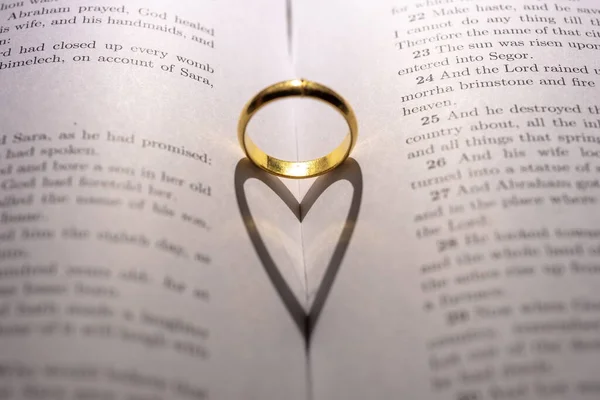 Wedding rings bible Stock Photos, Royalty Free Wedding rings bible ...