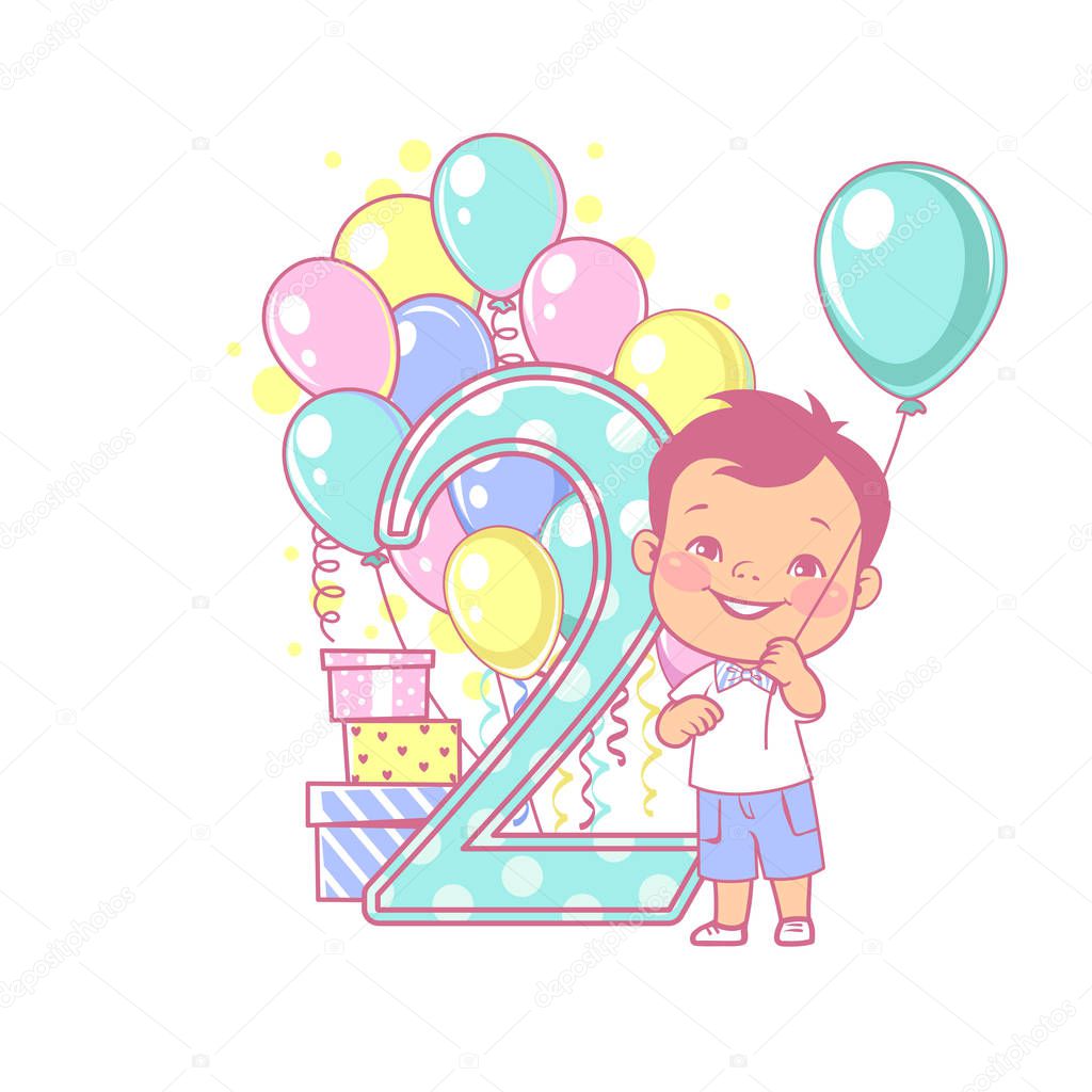 Un niño de dos años parado cerca del gran número 2. Celebración del ...