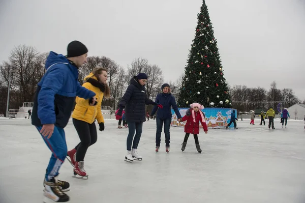 Ice skating in park Stock Photos, Royalty Free Ice skating in park ...
