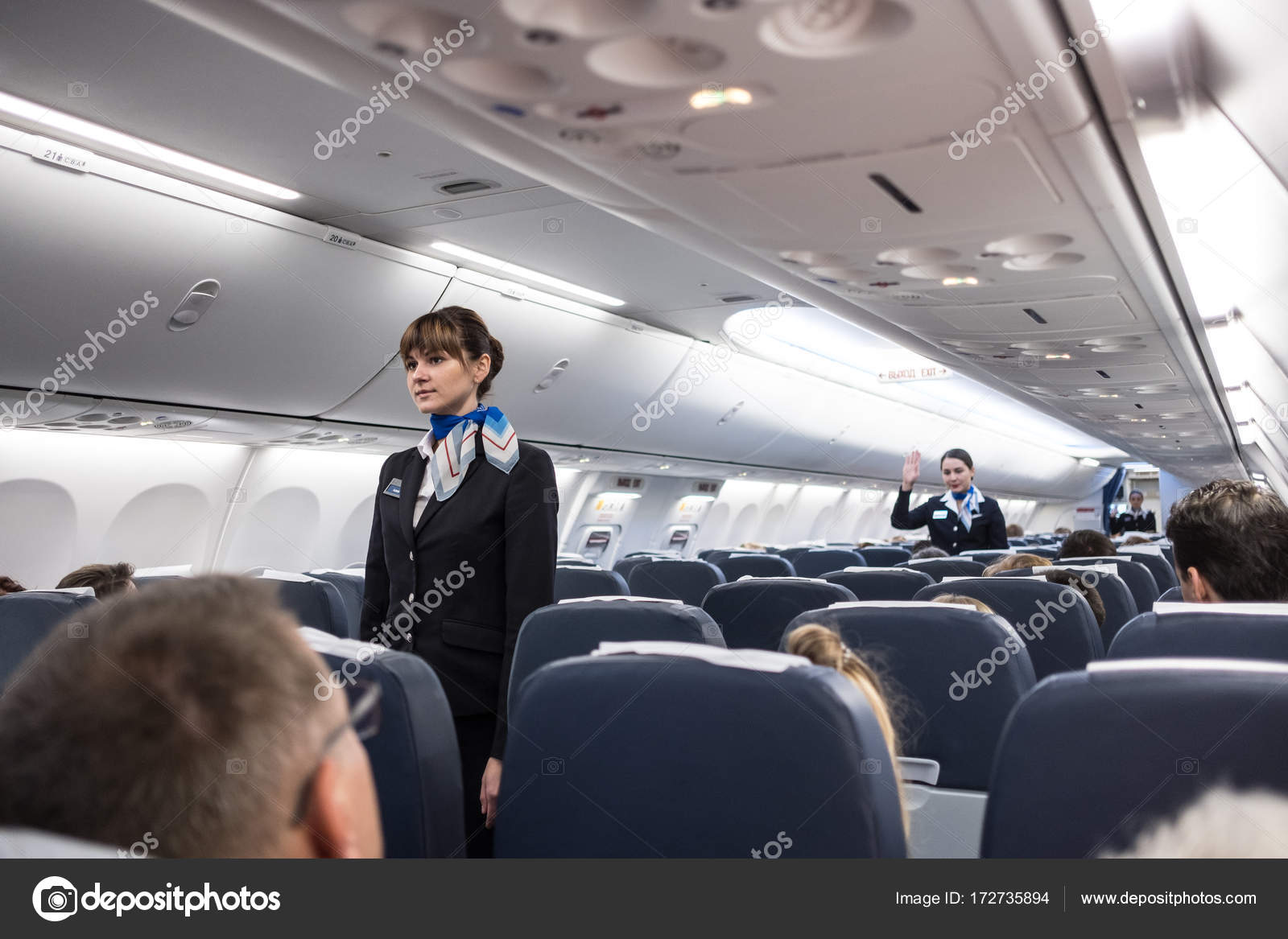 Safety briefing on board an aircraft – Stock Editorial Photo © gogiyan ...