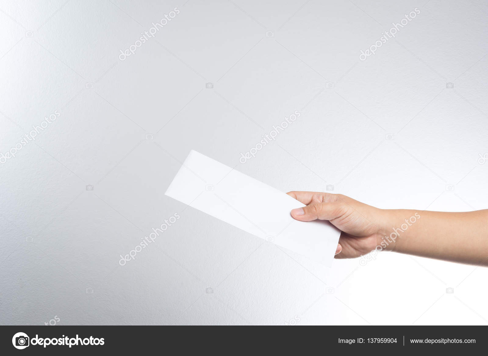 Hand holding envelope Stock Photo by ©BonNontawat 137959904