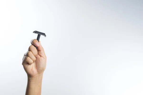 Hand with vintage shaving razor — Stock Photo © BonNontawat #137961826