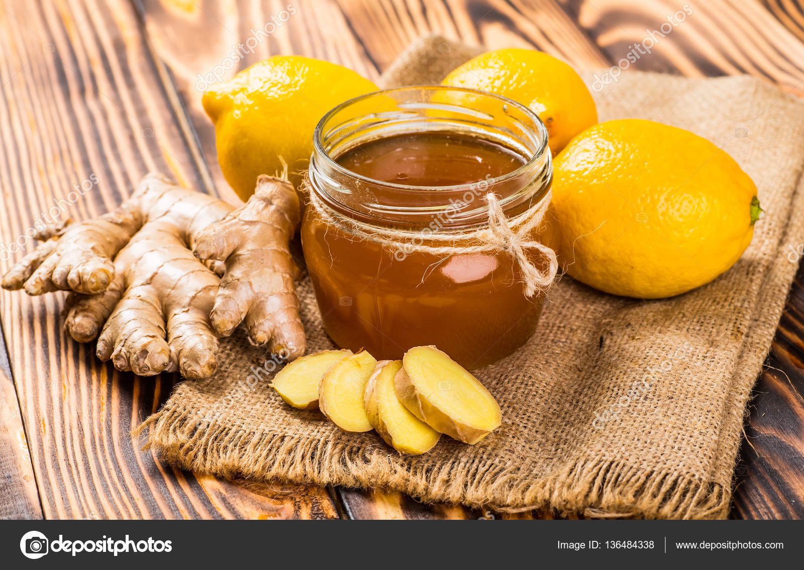 Honey with lemon and nuts. Stock Photo by ©bukhta79 136484338