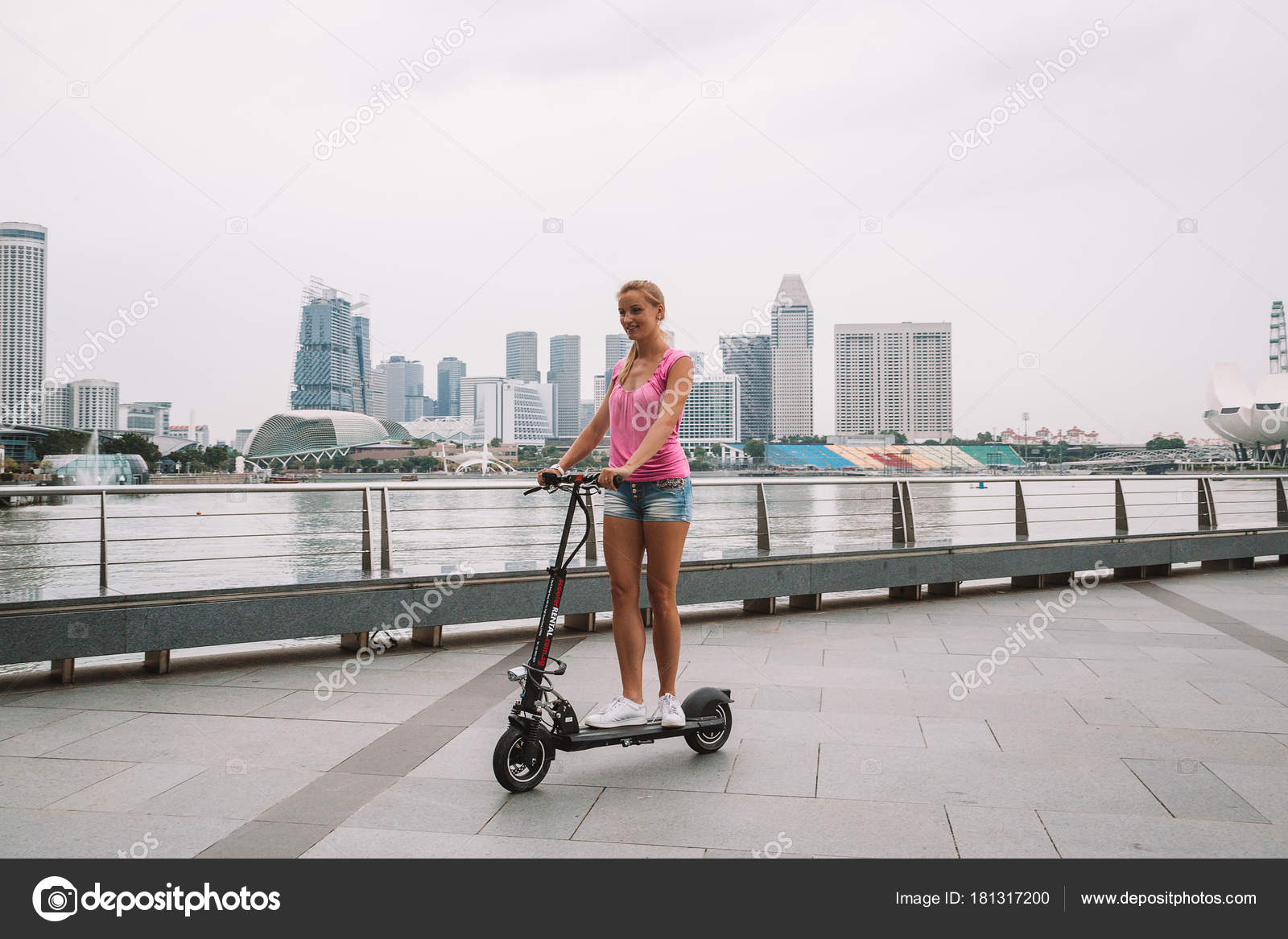 May 2017 Singapore Young Cute Girl Riding Electric Scooter Singapore ...
