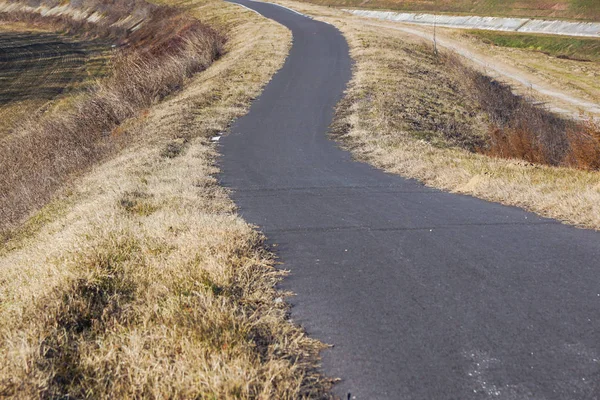 street path curving towards the horizon - Stock Image - Everypixel