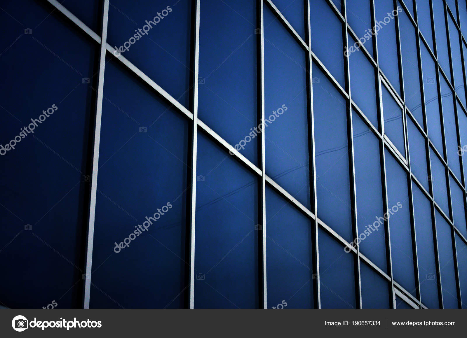 Solid Blue Windows Office Building Glass Wall Stock Photo by ©Mehaniq ...