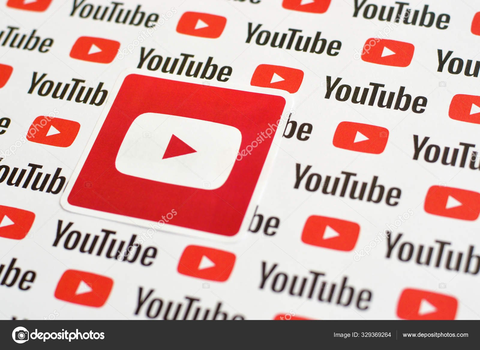 Youtube logo sticker on pattern printed on paper with small youtube ...